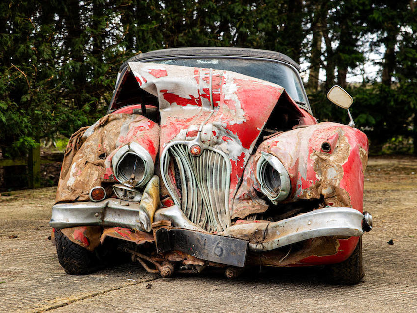 Smashed Jaguar fetches $164,000